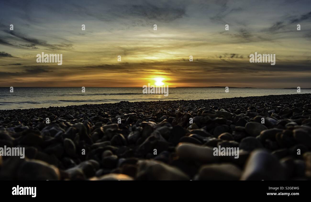 Pebbles beach sunset hi-res stock photography and images - Alamy