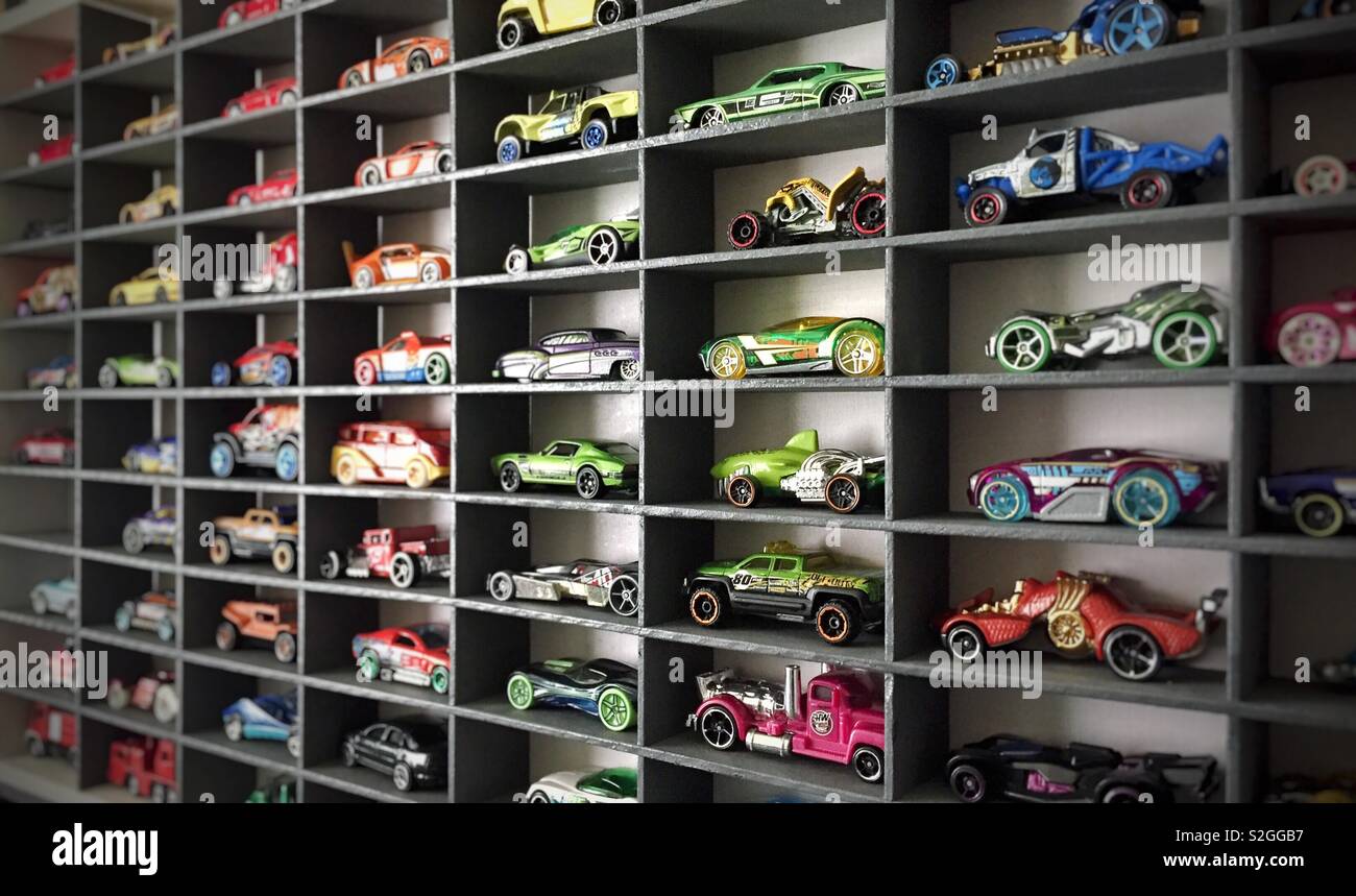 Toy cars organized by color Stock Photo - Alamy