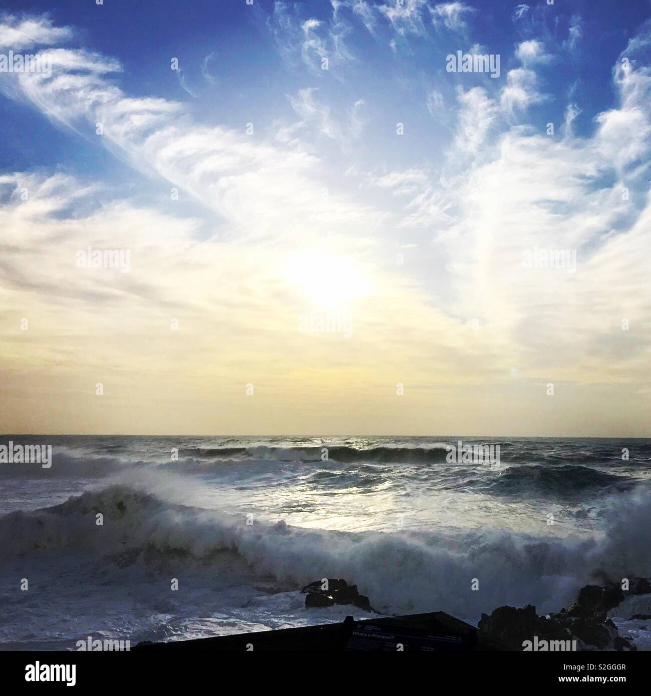 Waves and sky Stock Photo - Alamy