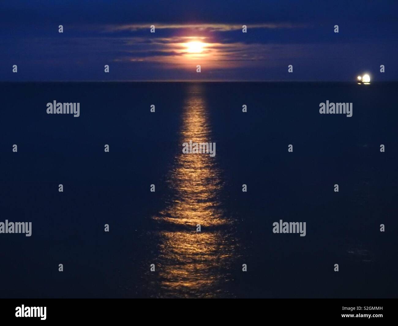Hunters moon rise over North Sea Stock Photo - Alamy