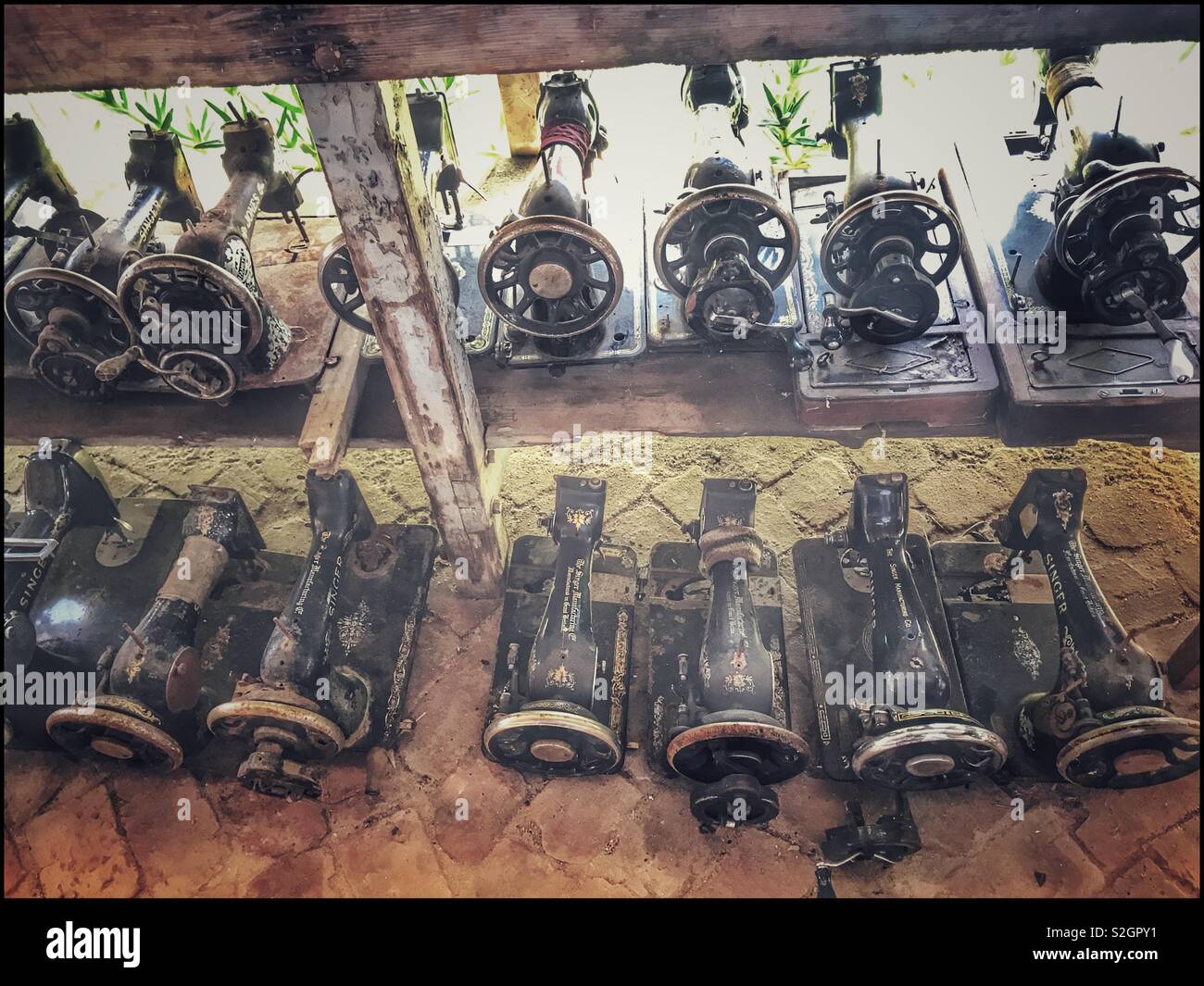 Rows of antique sewing machines at Toeka Stoor in Windmeul near Paarl ...