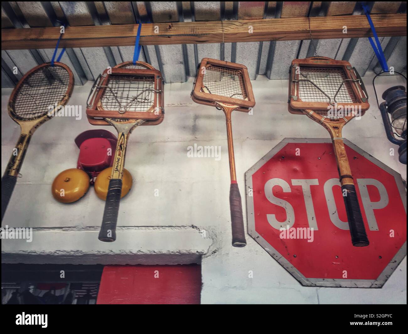 Vintage tennis racquets hanging in shed at Toeka Stoor in Windmeul near ...