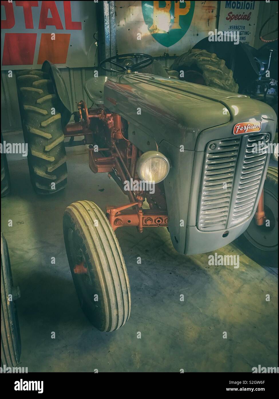 Vintage tractors in shed at Toeka Stoor in Windmeul near Paarl, South ...