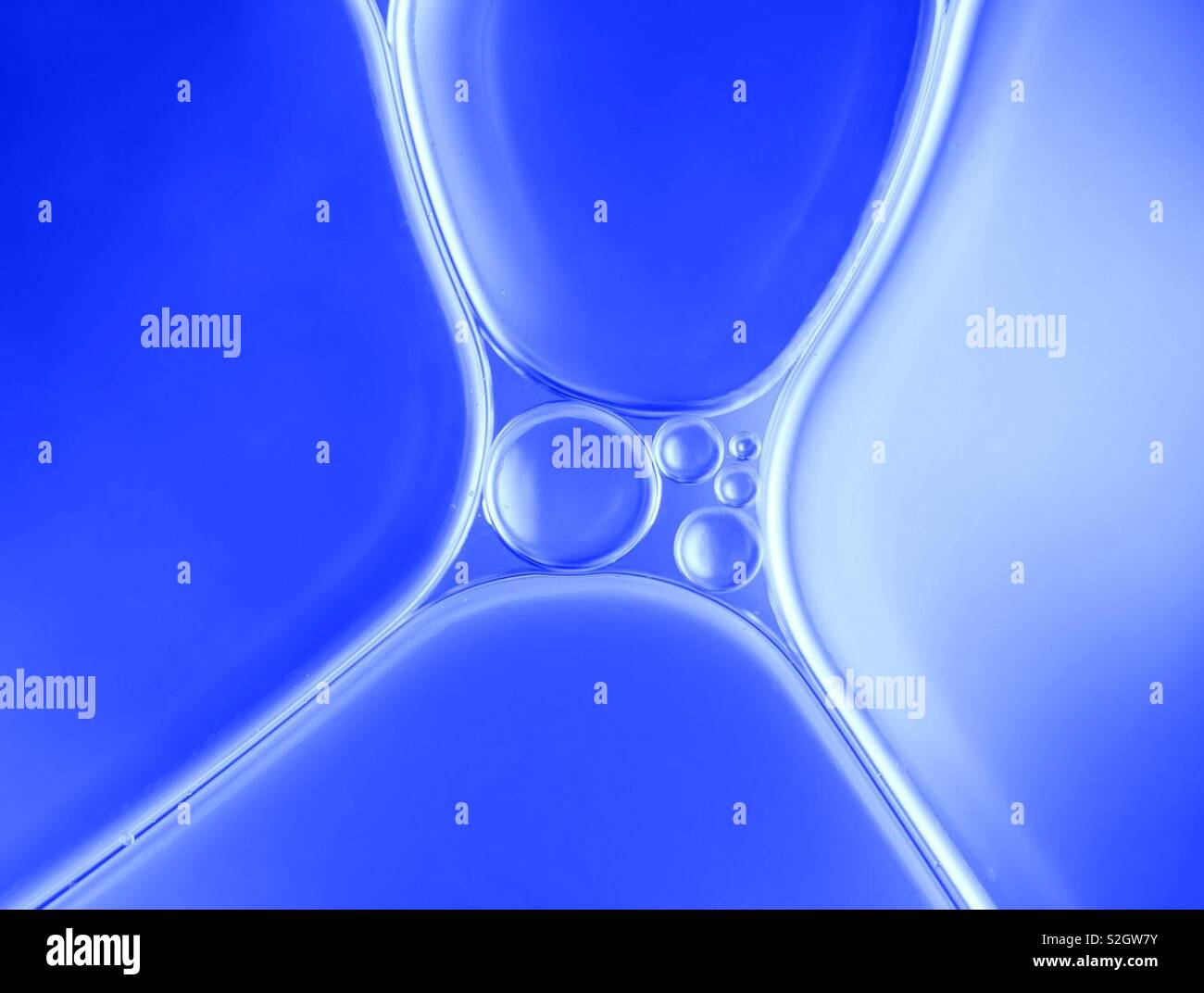 Blue bubbles - trapped Stock Photo - Alamy