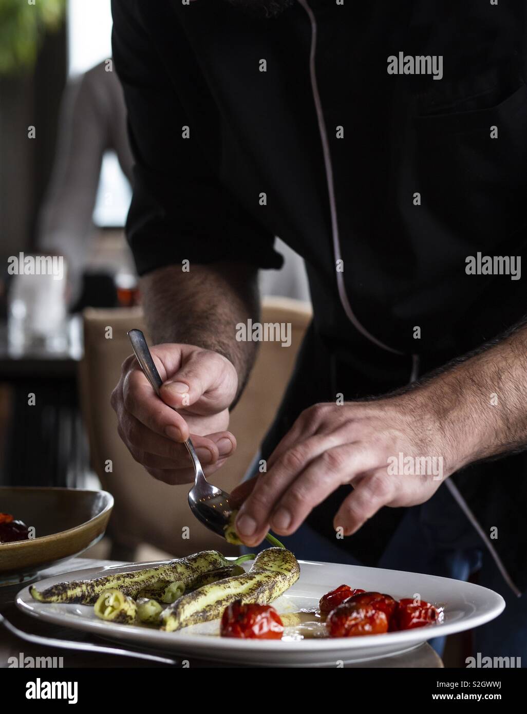 Chef is making tapas Stock Photo - Alamy
