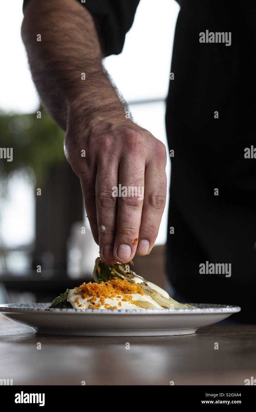 Chef is making tapas Stock Photo - Alamy