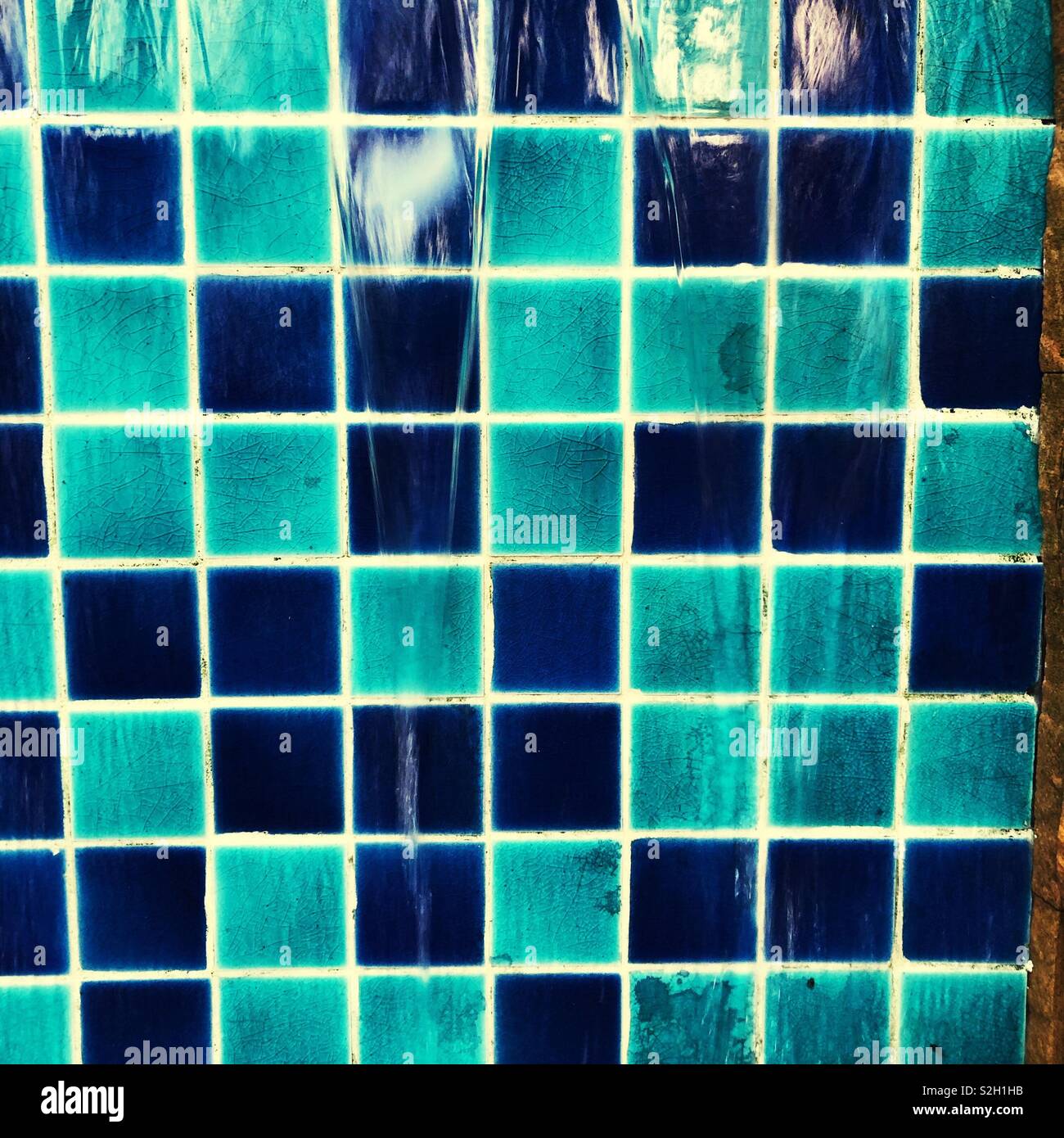Blue swimming pool tiles Stock Photo - Alamy
