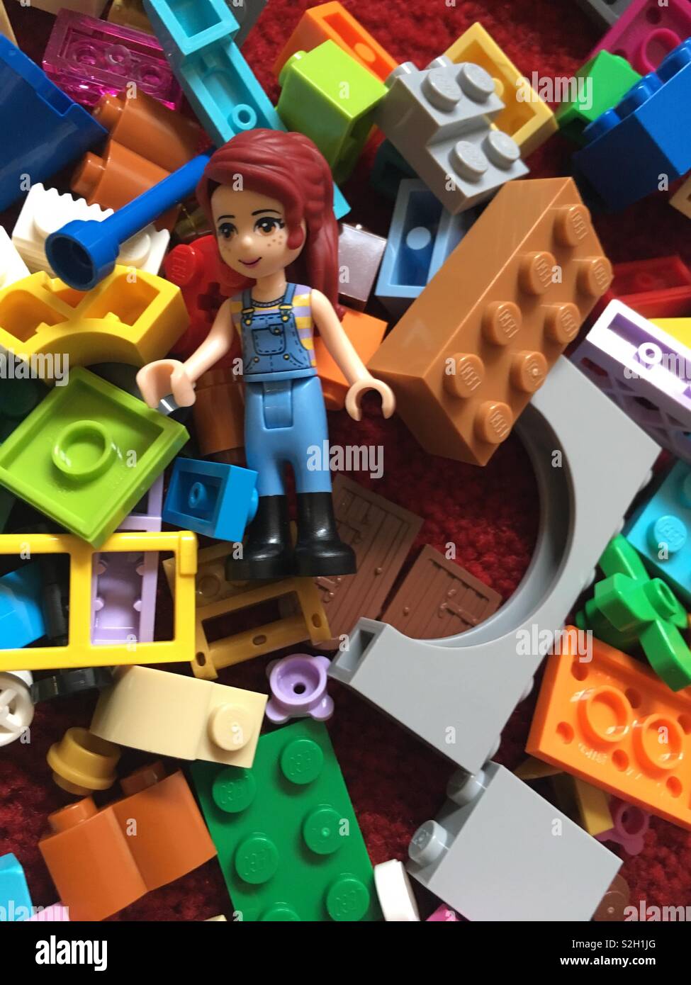 Lego play blocks lie on the ground Stock Photo - Alamy