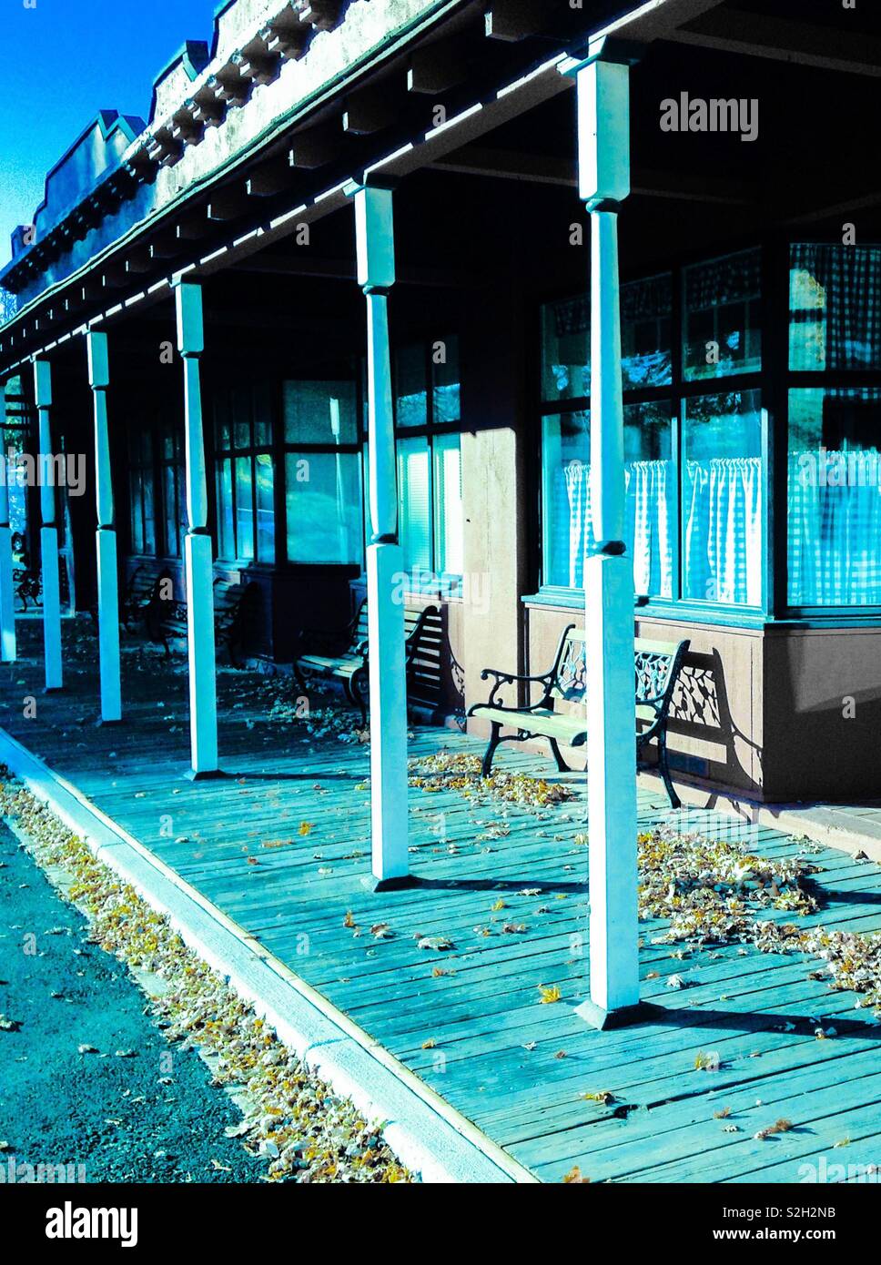 Angled view in blue down plank sidewalk in front of Old West looking ...