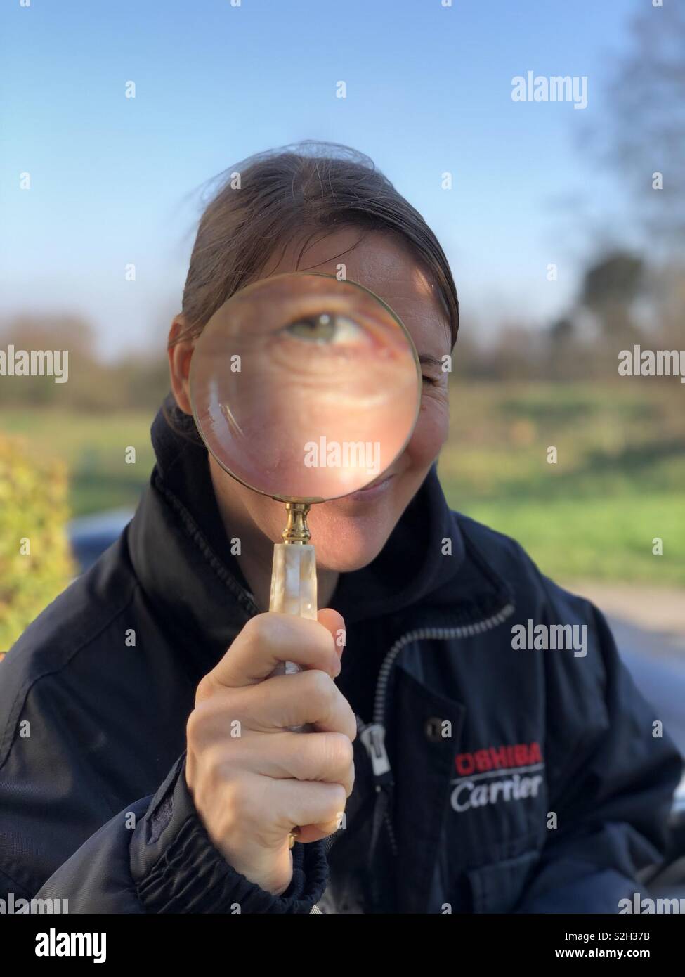 Woman detective magnifying glass hi-res stock photography and images ...