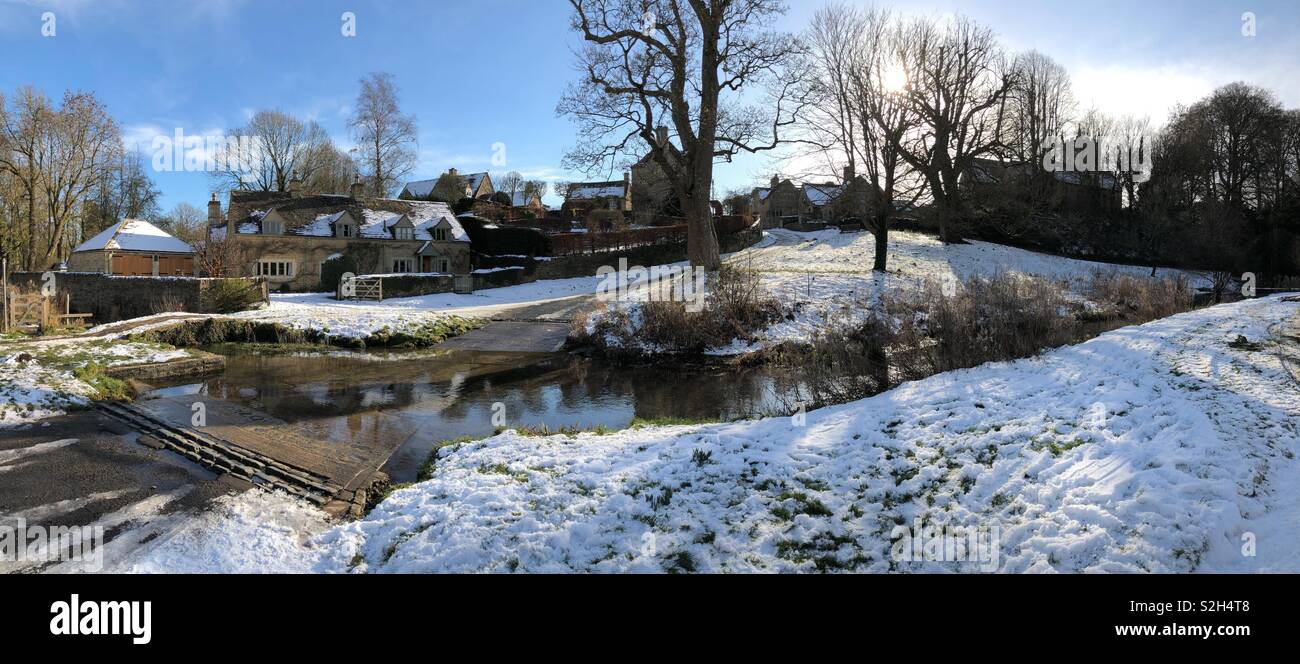 Panorama of Upper Slaughter Village in the Cotswolds in snow and ice ...