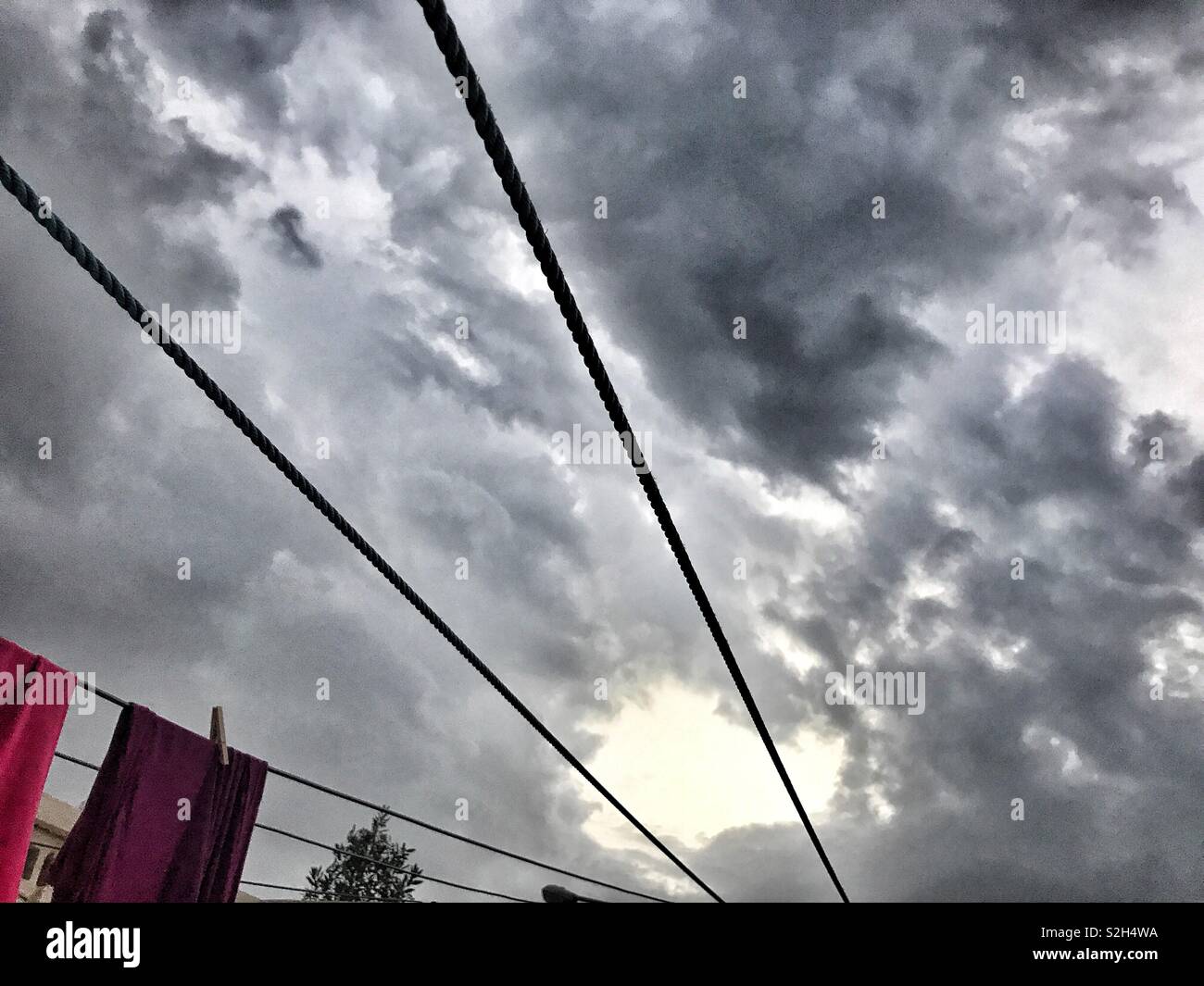 Rain and drying clothes Stock Photo - Alamy