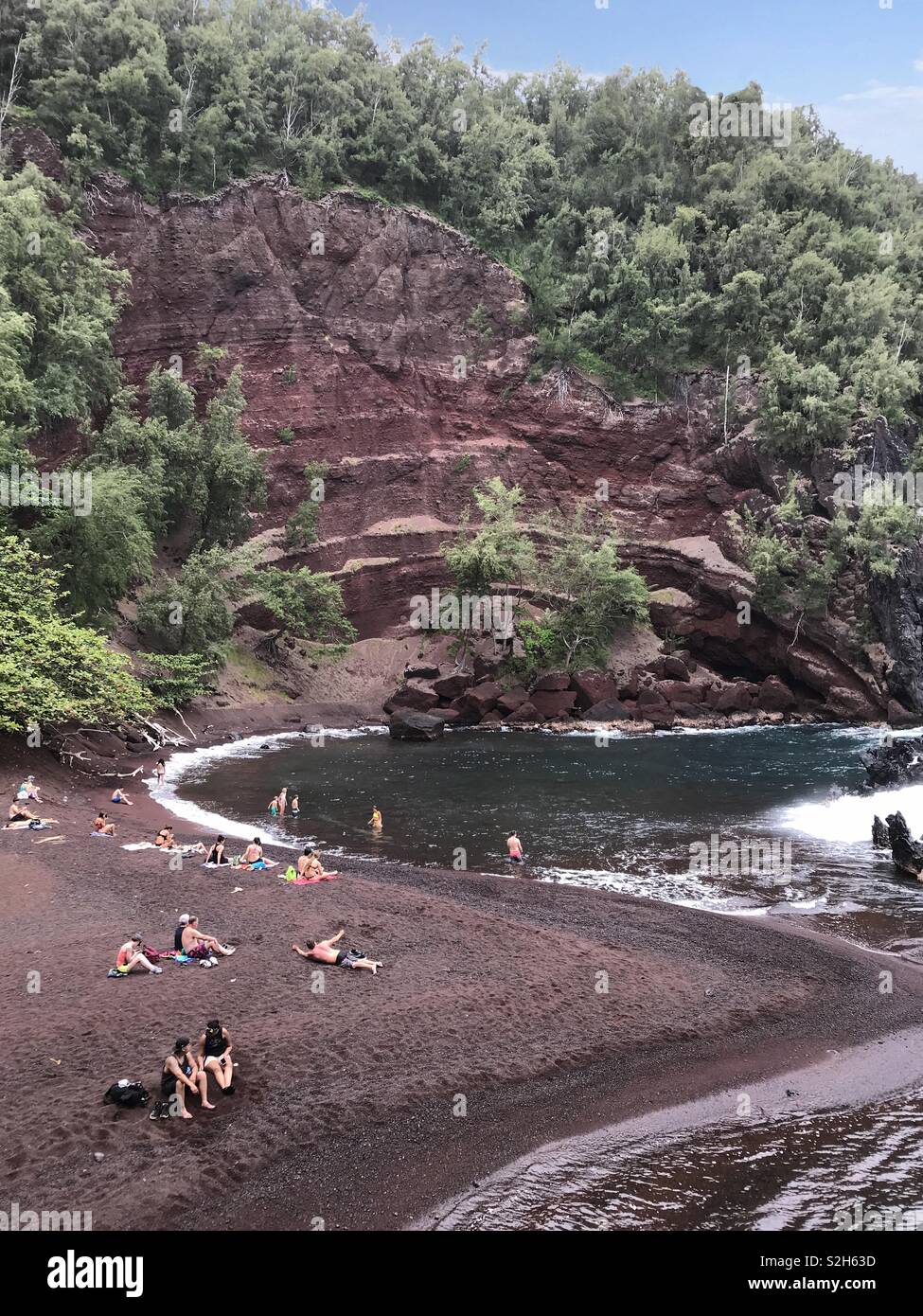 A red sand beach, formed by the collapsed Ka’uiki Head volcanic cinder ...