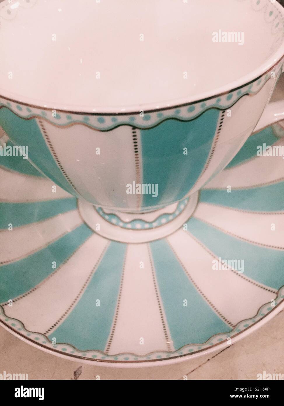 Closeup of vintage Tiffany blue and cream tea cup Stock Photo - Alamy