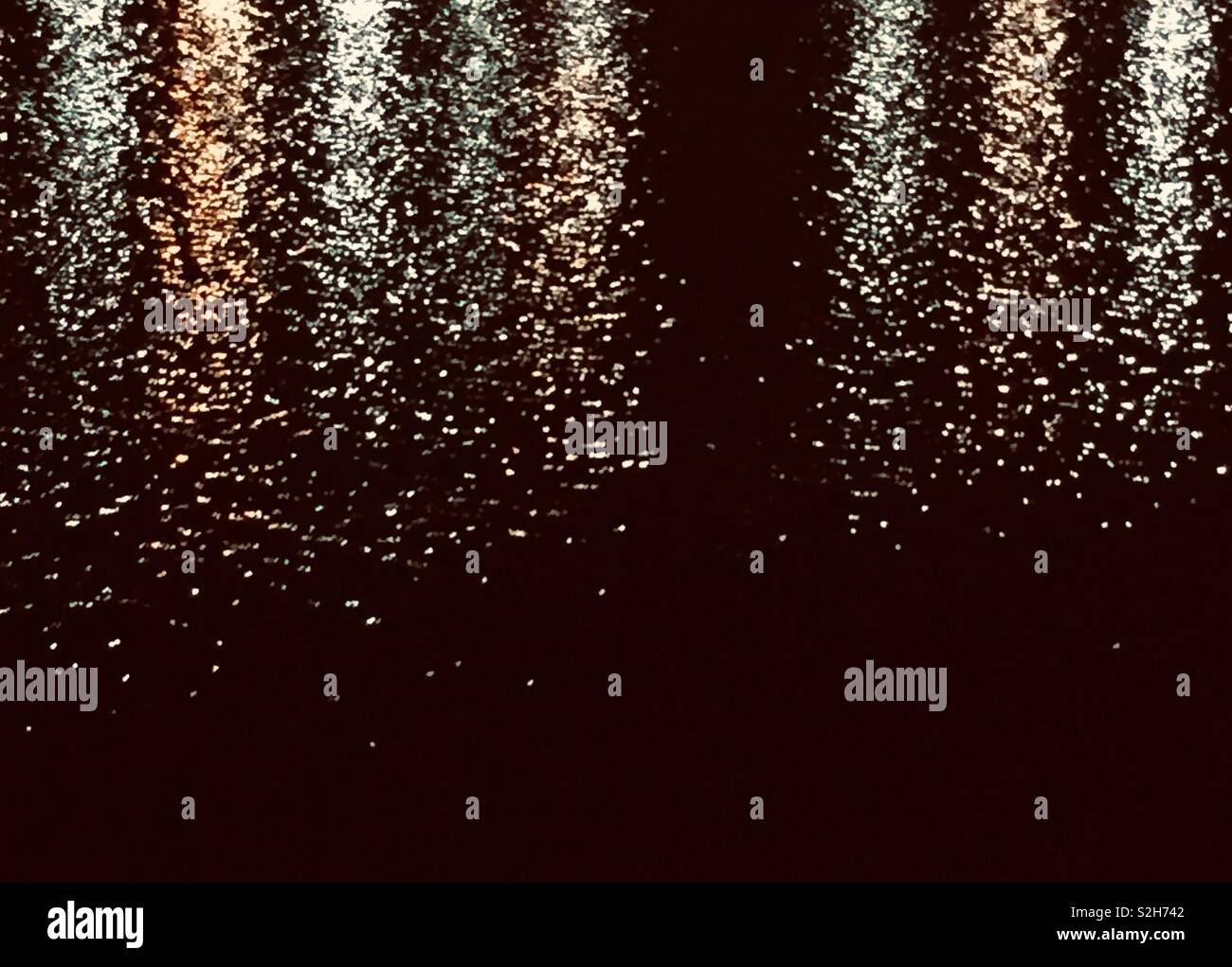 Light sparkles on the surface of the water. Abstract water surface ...