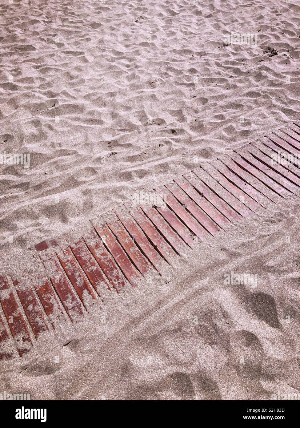 Wooden path over the sand Stock Photo - Alamy
