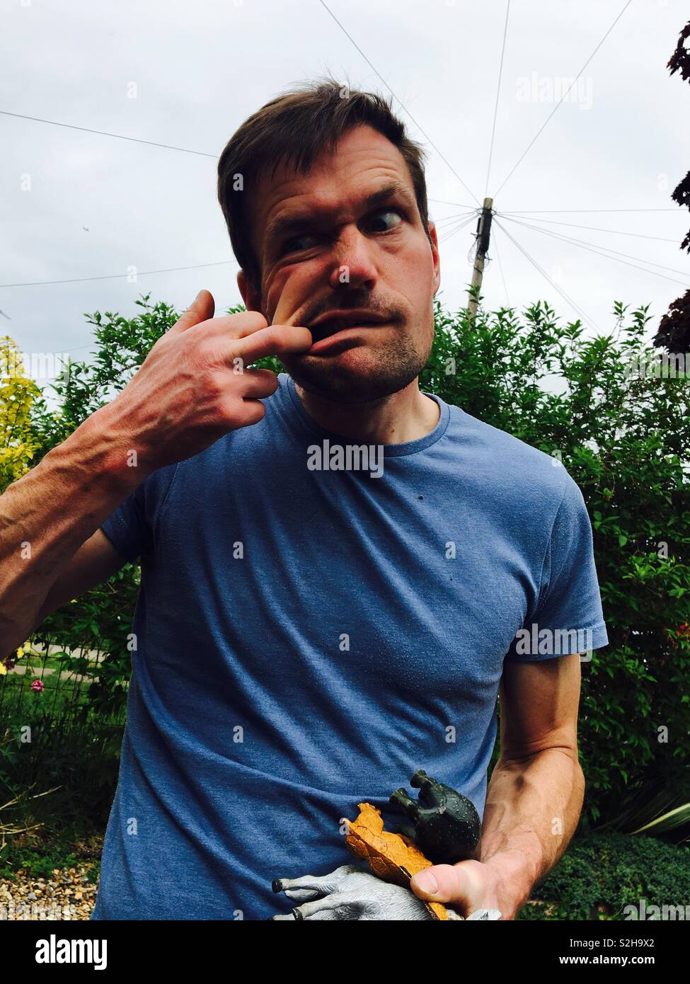 Man hooked hi-res stock photography and images - Alamy