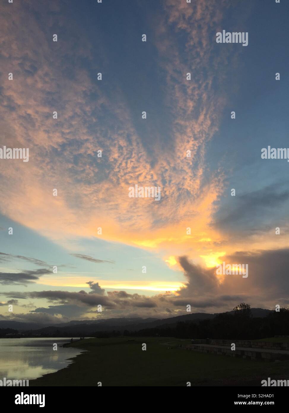 Amazing shapes in this sunset over lake Stock Photo - Alamy
