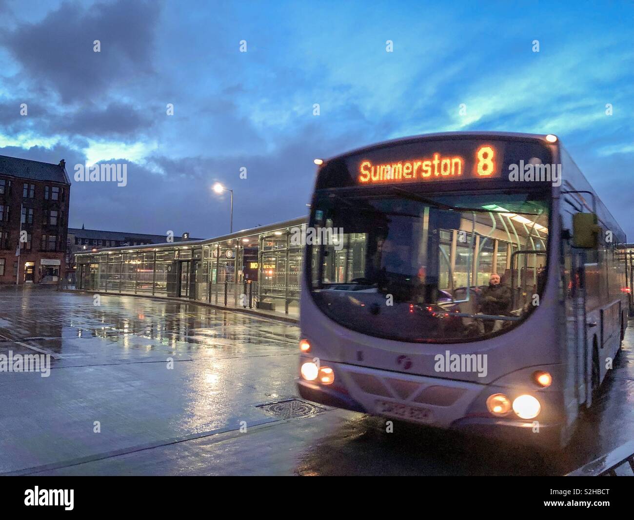 No. 8 to Summerston on a cold, wet morning, Partick, Glasgow. Scotland ...