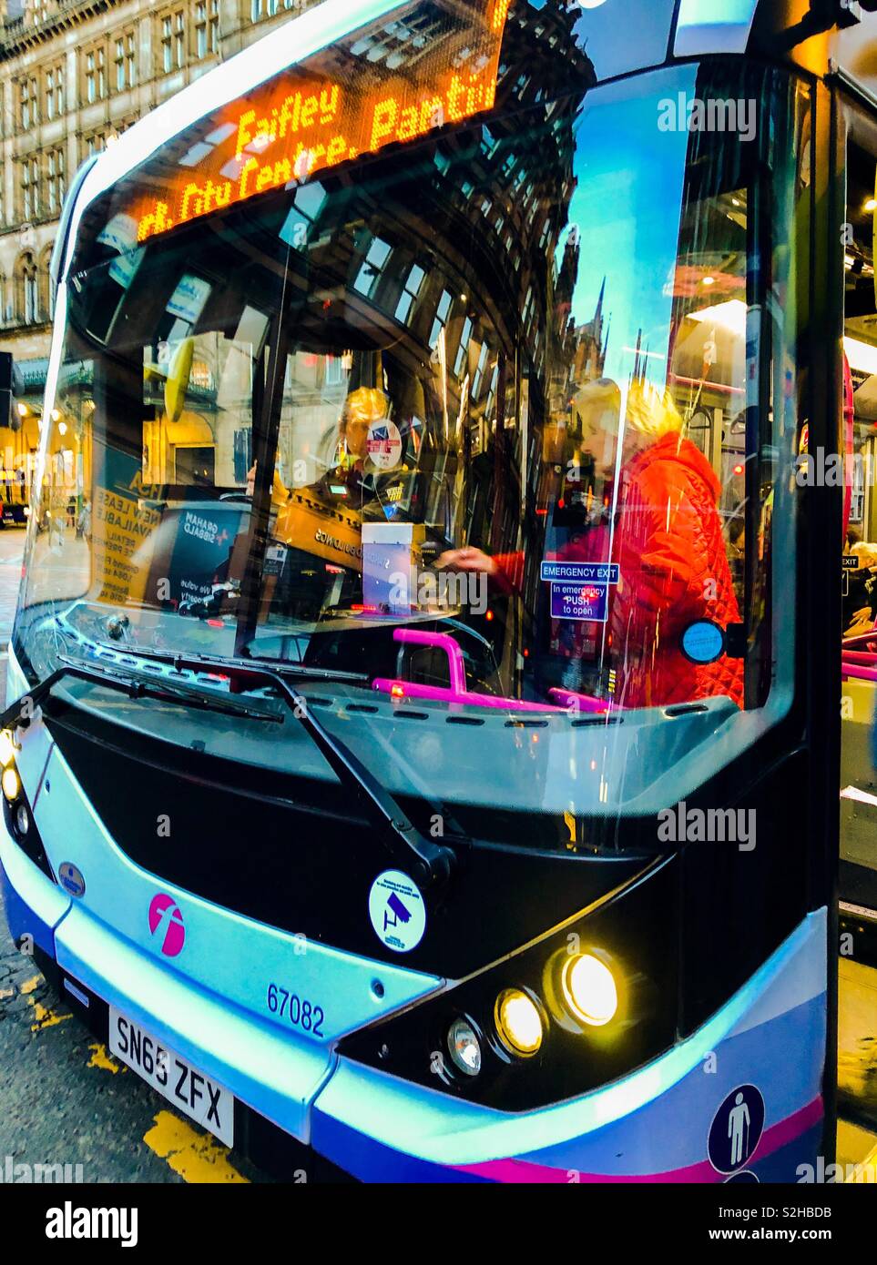 Paying the fare. Glasgow city centre. Scotland. UK Stock Photo - Alamy