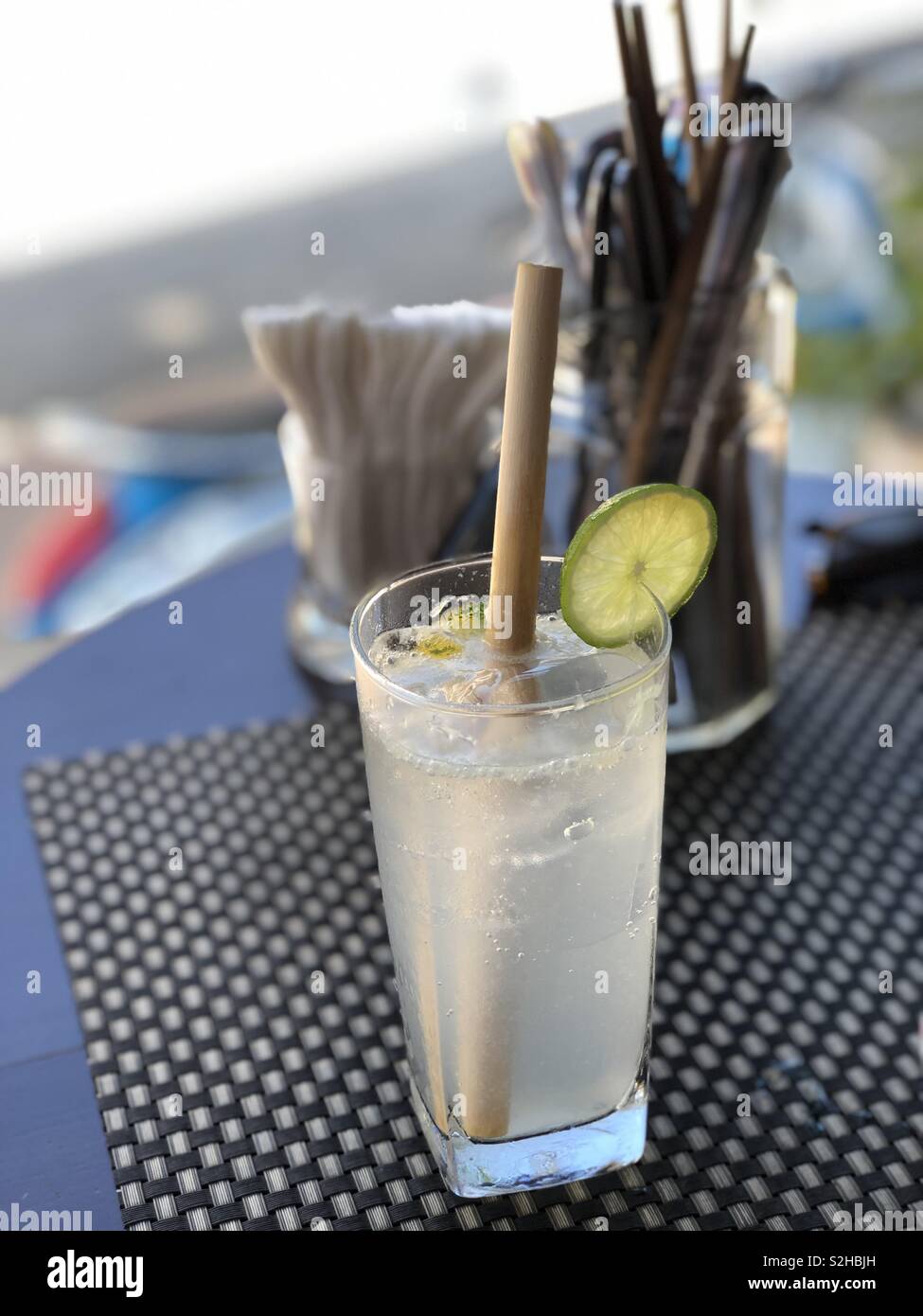Focus on fresh lime soda on table top Stock Photo - Alamy