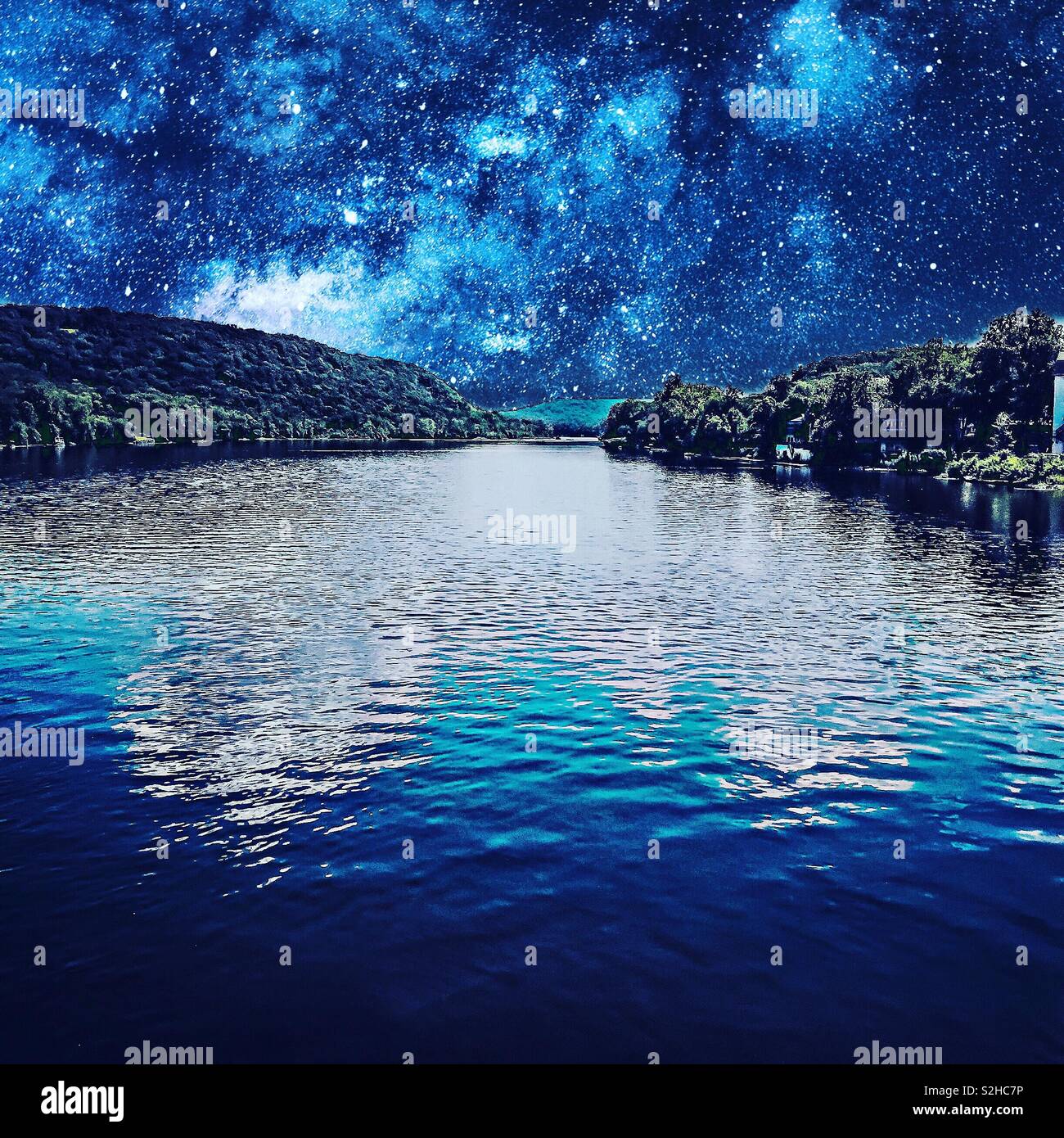 Night sky over water Stock Photo - Alamy