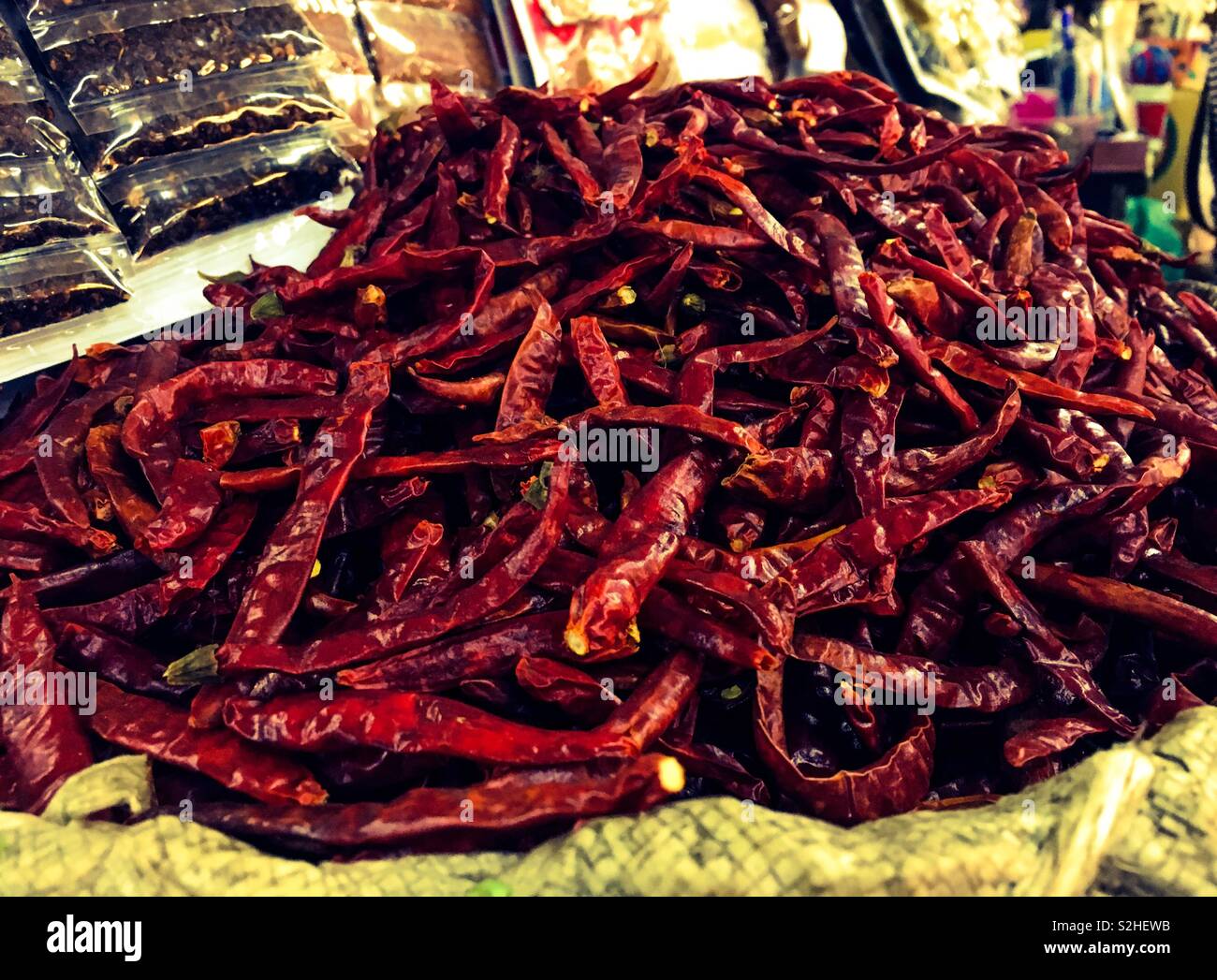 Dry red chilly in the market Stock Photo - Alamy