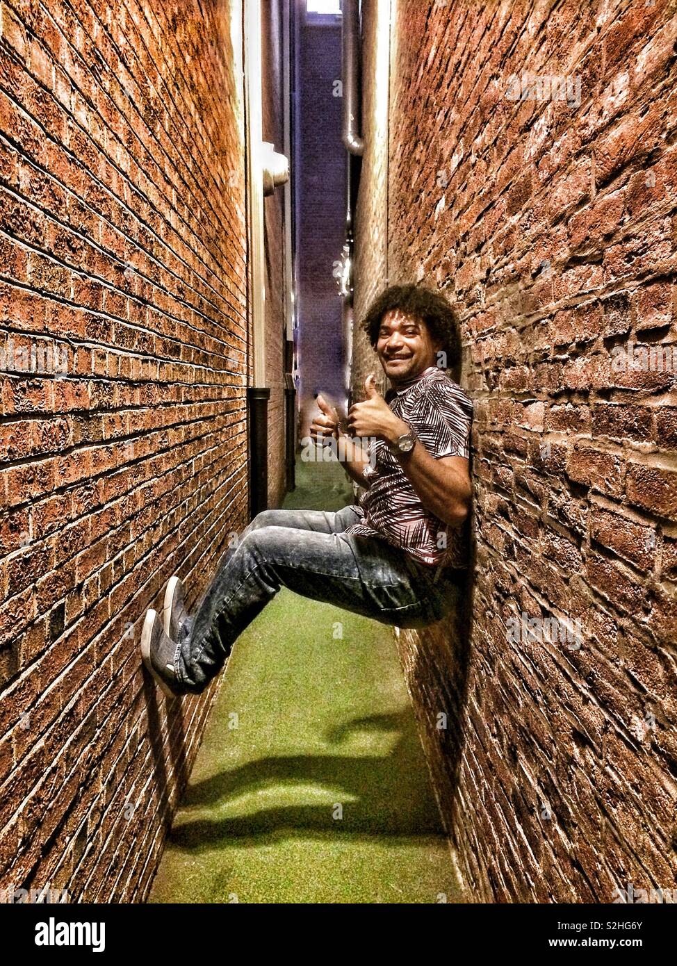 Caught between two walls Stock Photo - Alamy