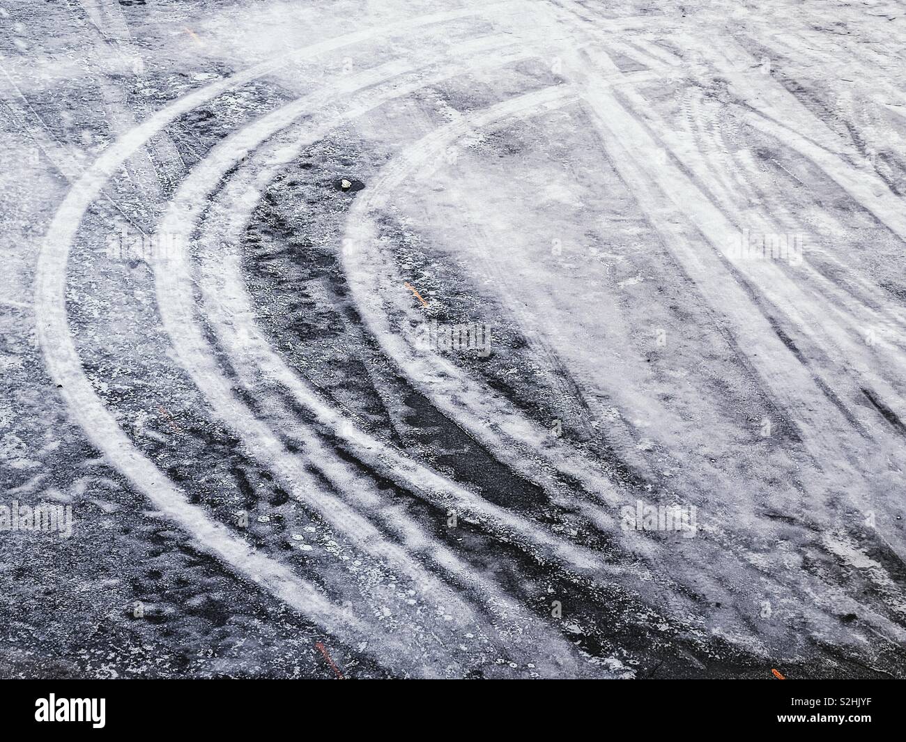 Tyre tracks in ice on frozen road Sweden Stock Photo - Alamy