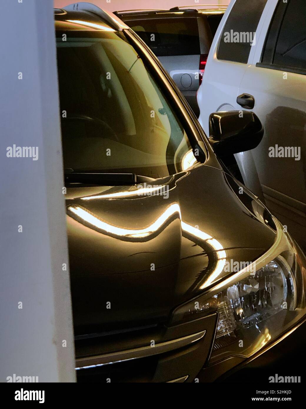 Parking garage jammed with cars Stock Photo - Alamy