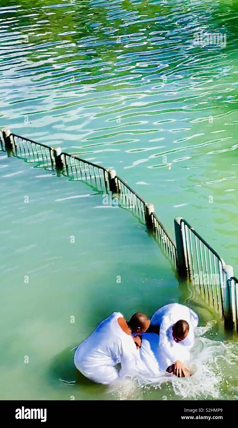 Baptism at the Jordan river in Israel Stock Photo - Alamy
