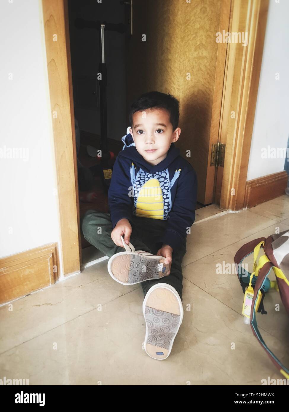 Taking off shoes hi-res stock photography and images - Alamy