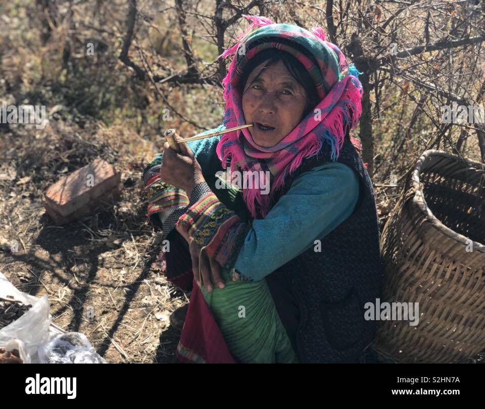 The pipe lady Stock Photo - Alamy