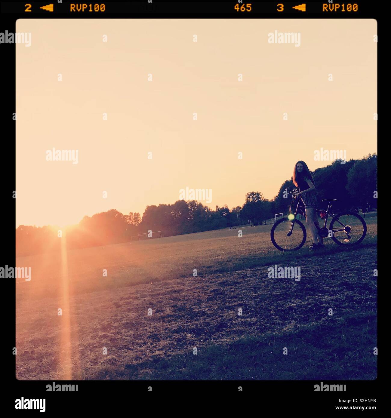 Sunset bike ride Stock Photo - Alamy