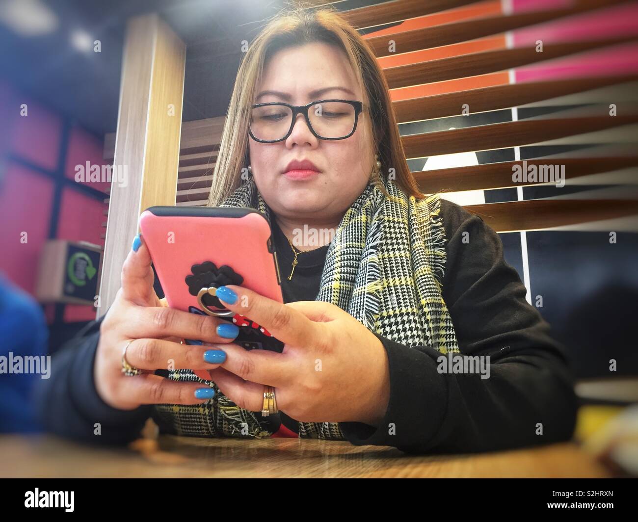 Portrait asian filipino woman smartphone stock photos and images - Alamy