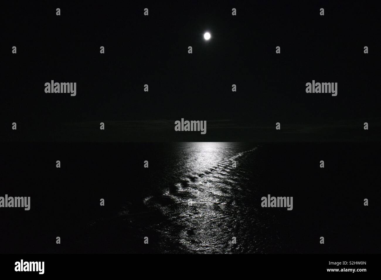 Night Moonlight reflection at sea Stock Photo - Alamy