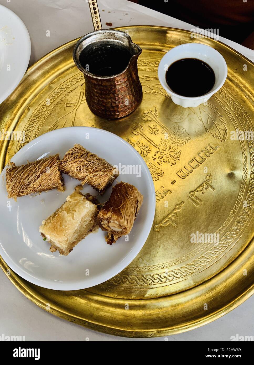 Traditional Arab coffee served with Baklawa- Traditional middle eastern ...