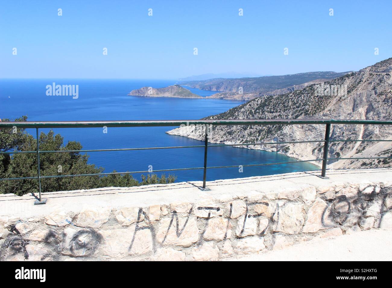 Blue sea coast line in Greece Stock Photo - Alamy