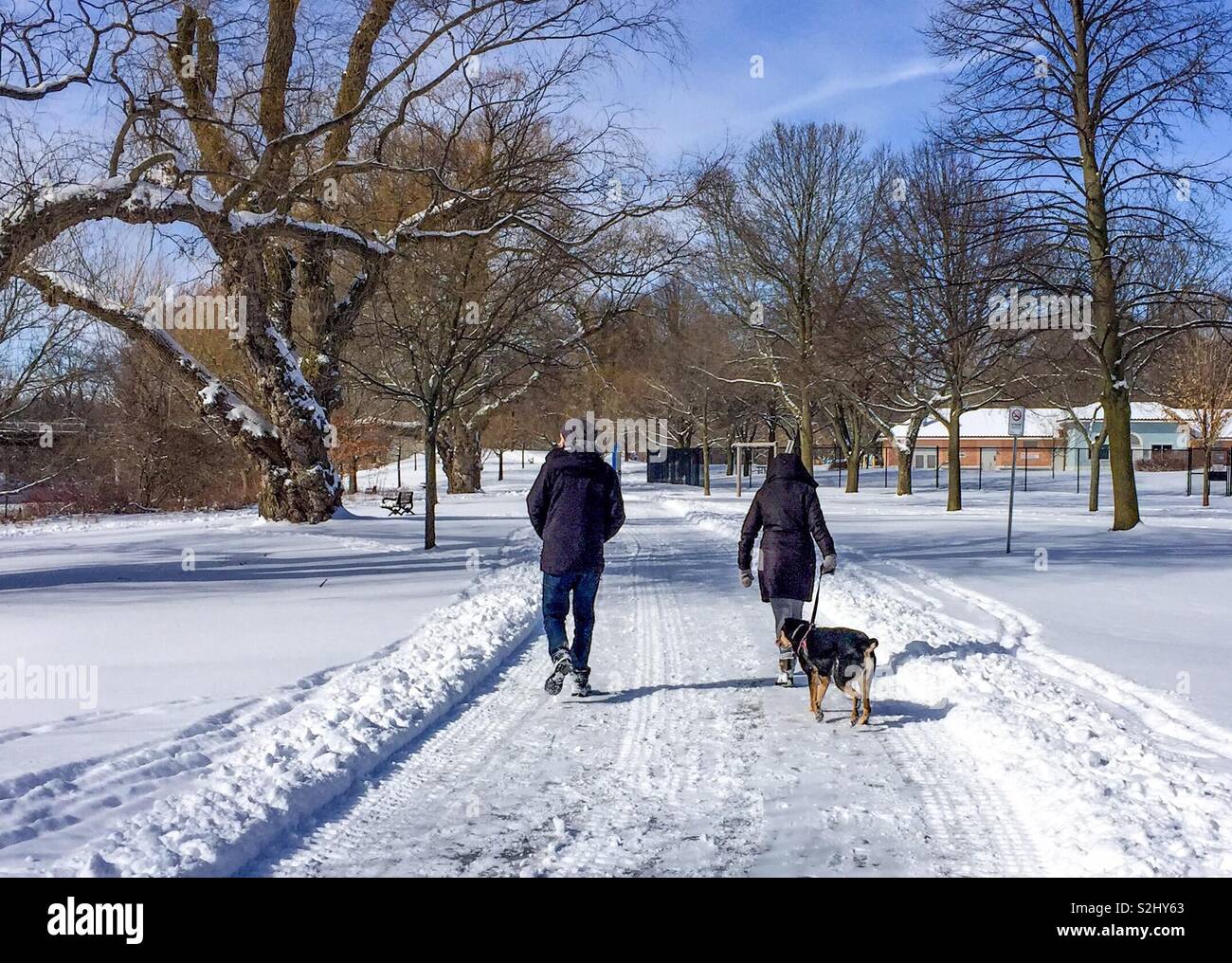 Family Outing in Snow Stock Photo - Alamy