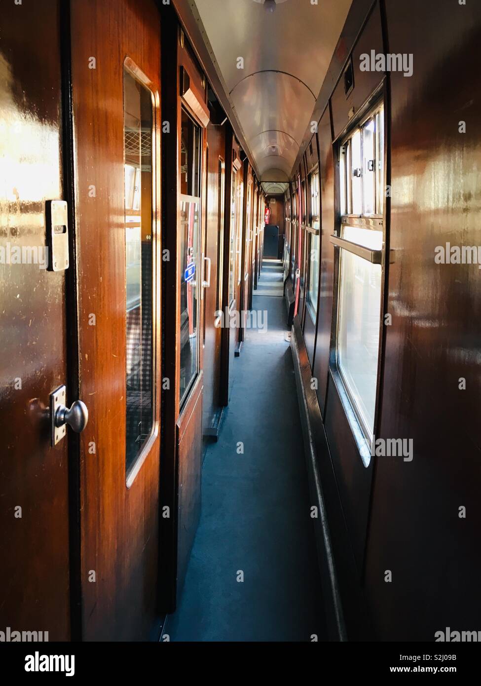Corridor in first class carriage on the Severn Valley Railway ...