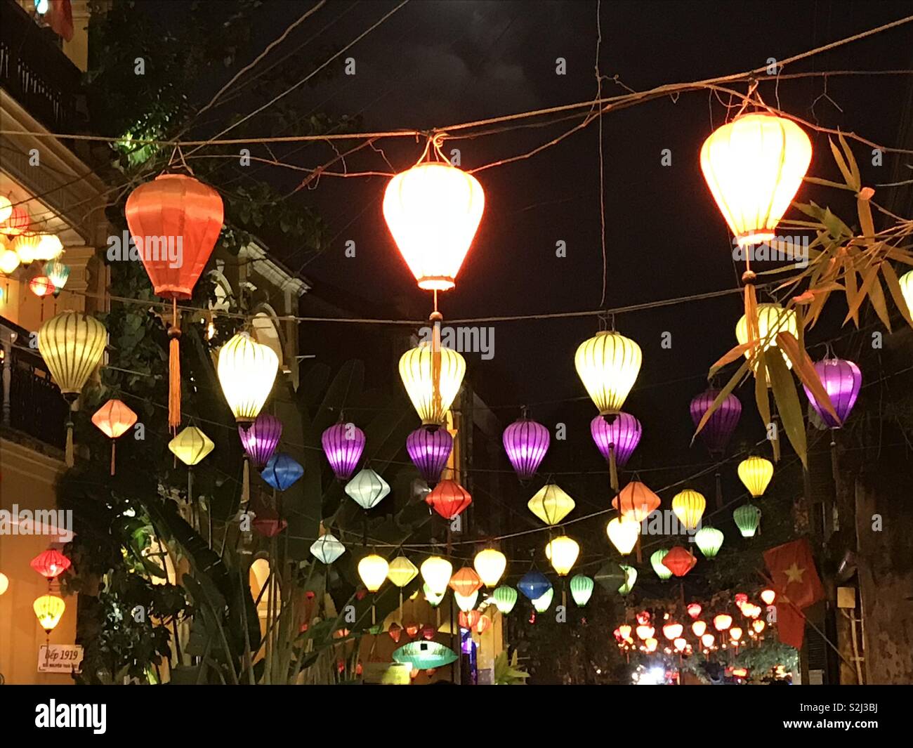 Lantern lit street in Hoi An, Vietnam Stock Photo - Alamy