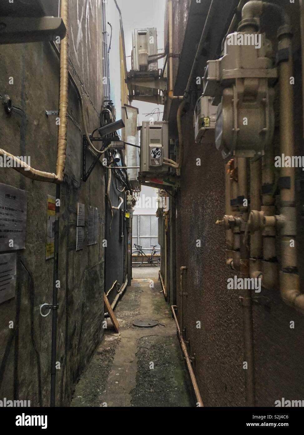 Shinjuku alleyway at daytime Stock Photo - Alamy