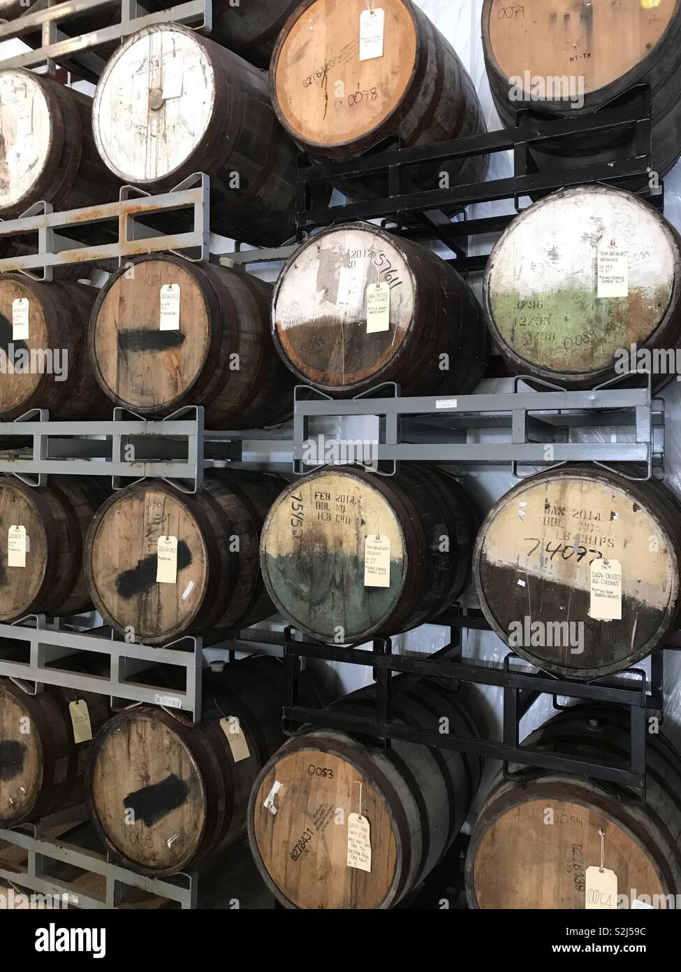 Casks line the wall at B-52 Brewing Co. in Conroe, Texas Stock Photo ...