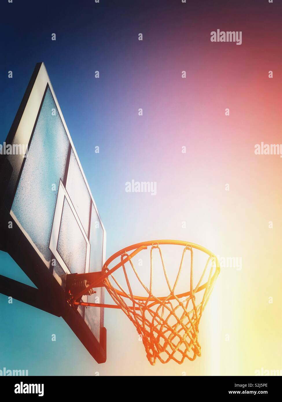 Looking up at basketball net Stock Photo - Alamy