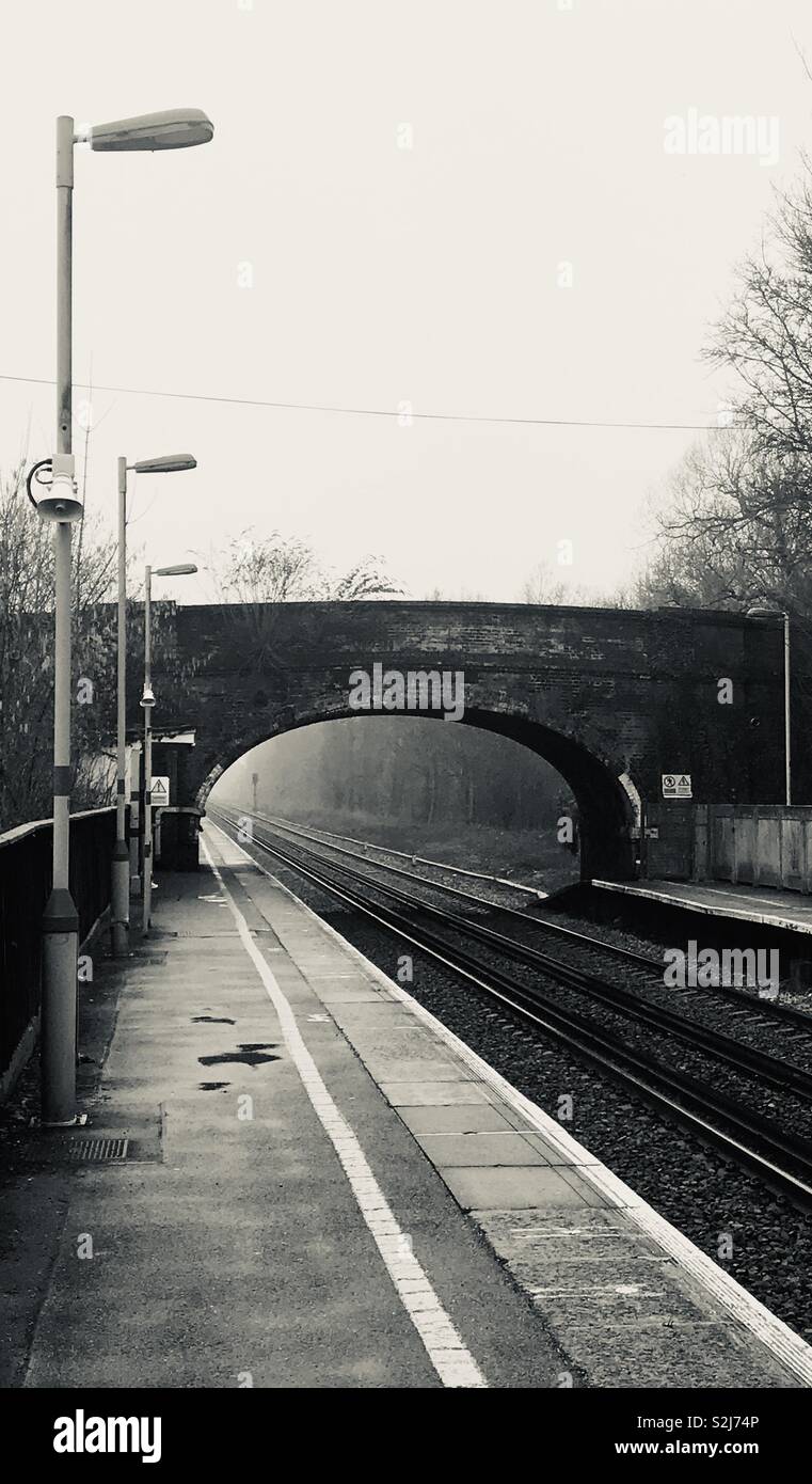 Road bridge over railway and platform. March 2019 Stock Photo - Alamy