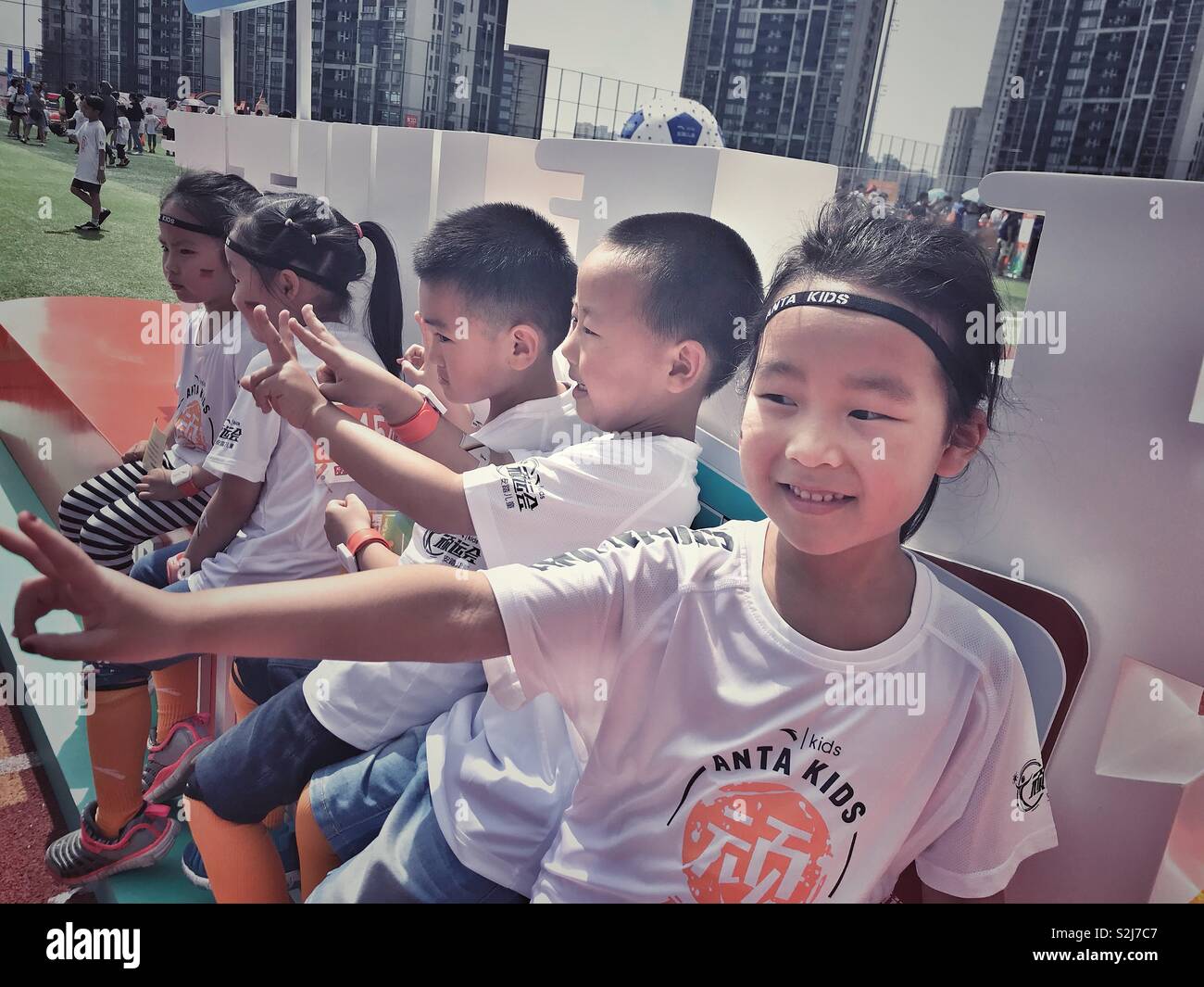 A group of Chinese kids attend a sport activity Stock Photo - Alamy