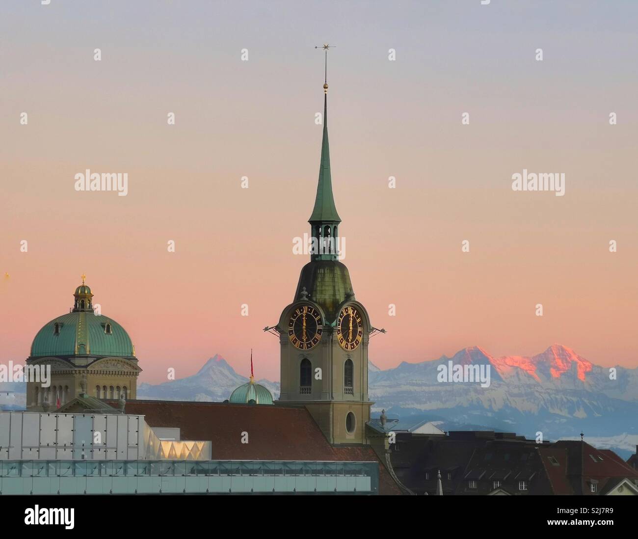 Skyline of Bern, Switzerland at dusk, including the national parliament ...