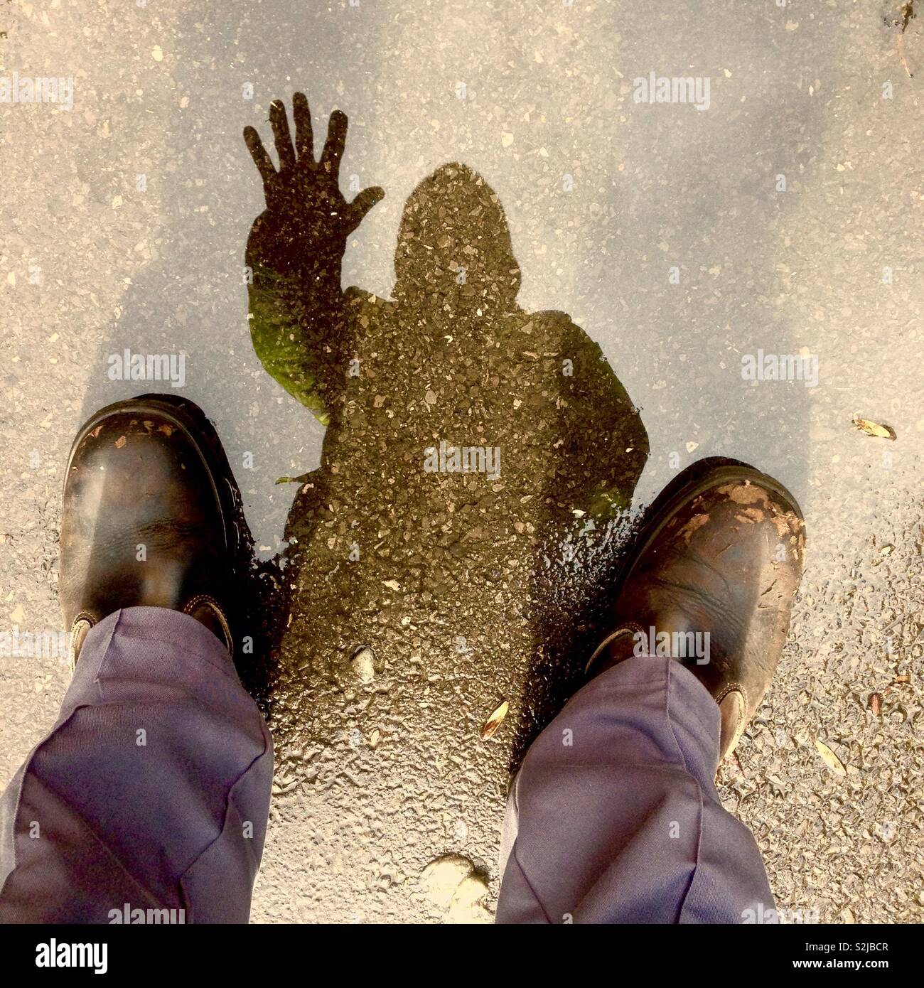 Man puddle water hi-res stock photography and images - Alamy