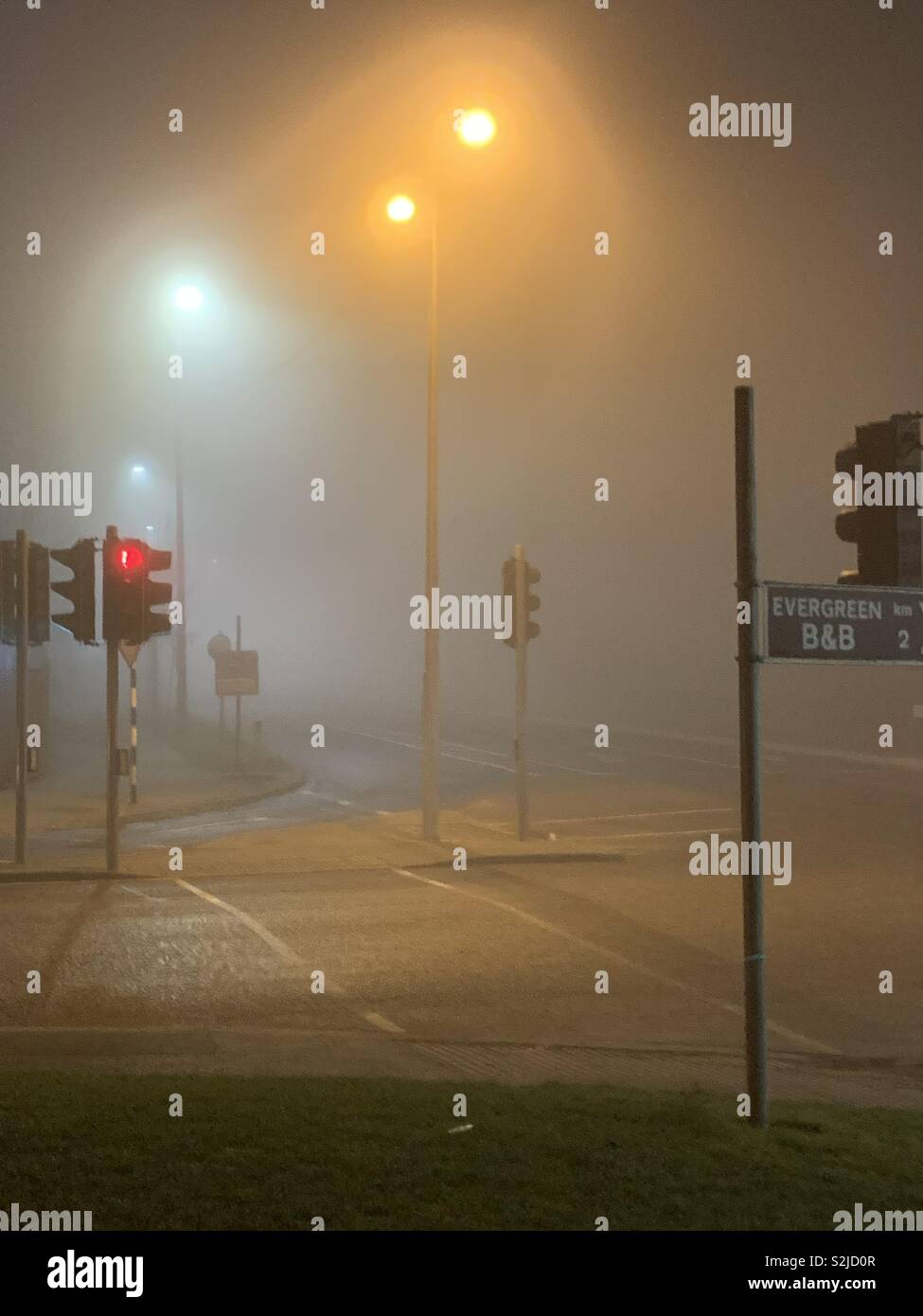 Road signs fog hi-res stock photography and images - Alamy