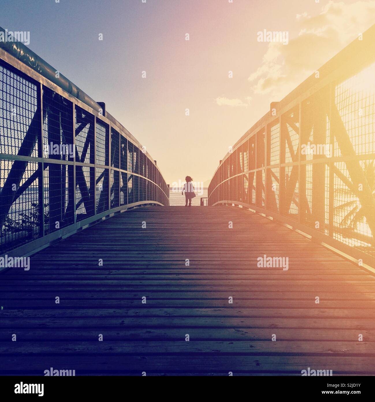 Girl alone on the bridge hi-res stock photography and images - Alamy